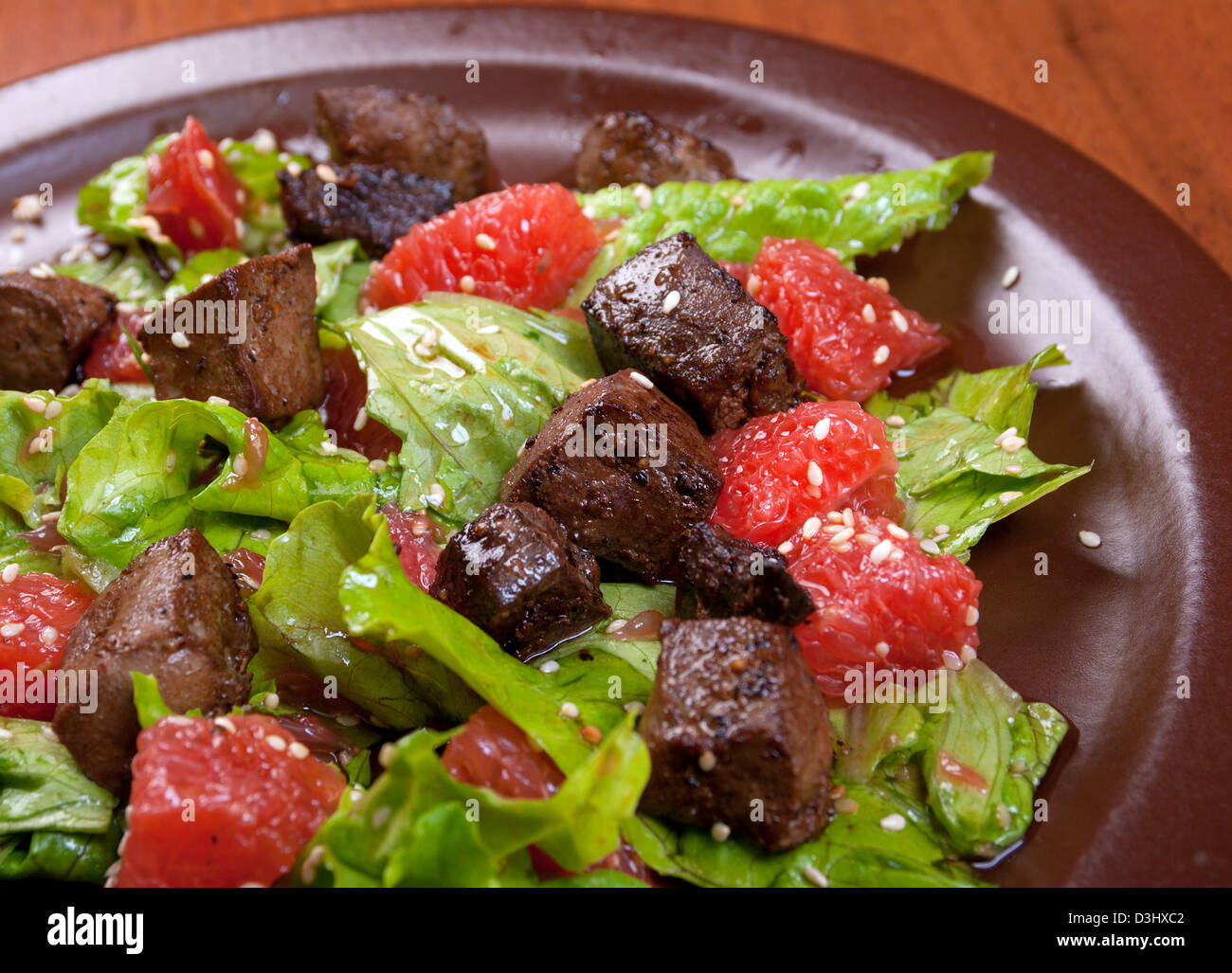 meat salad with vegetable and sesame. spanish kitchen Stock Photo - Alamy