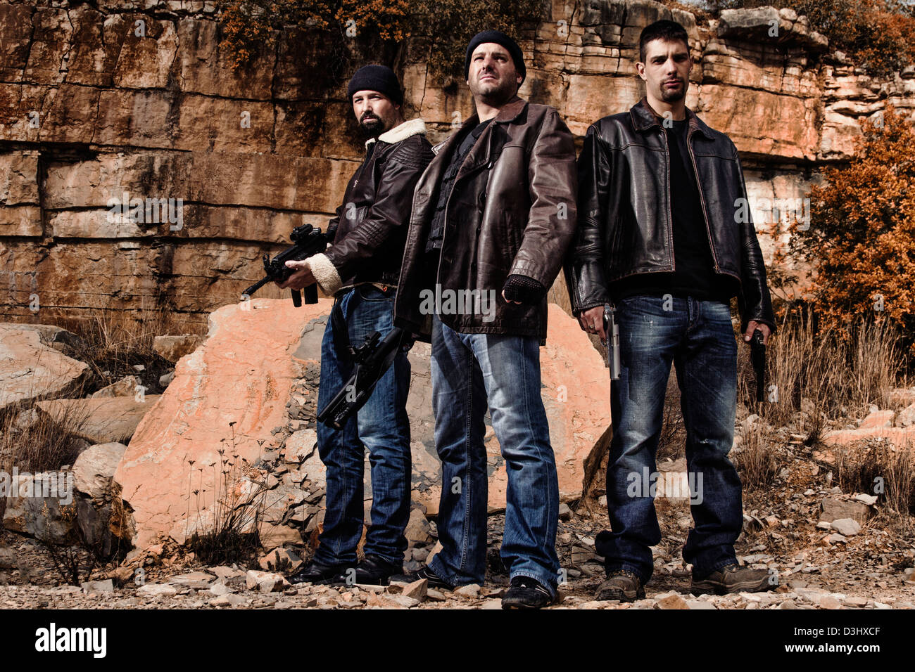 View of a group of gang members with guns Stock Photo - Alamy