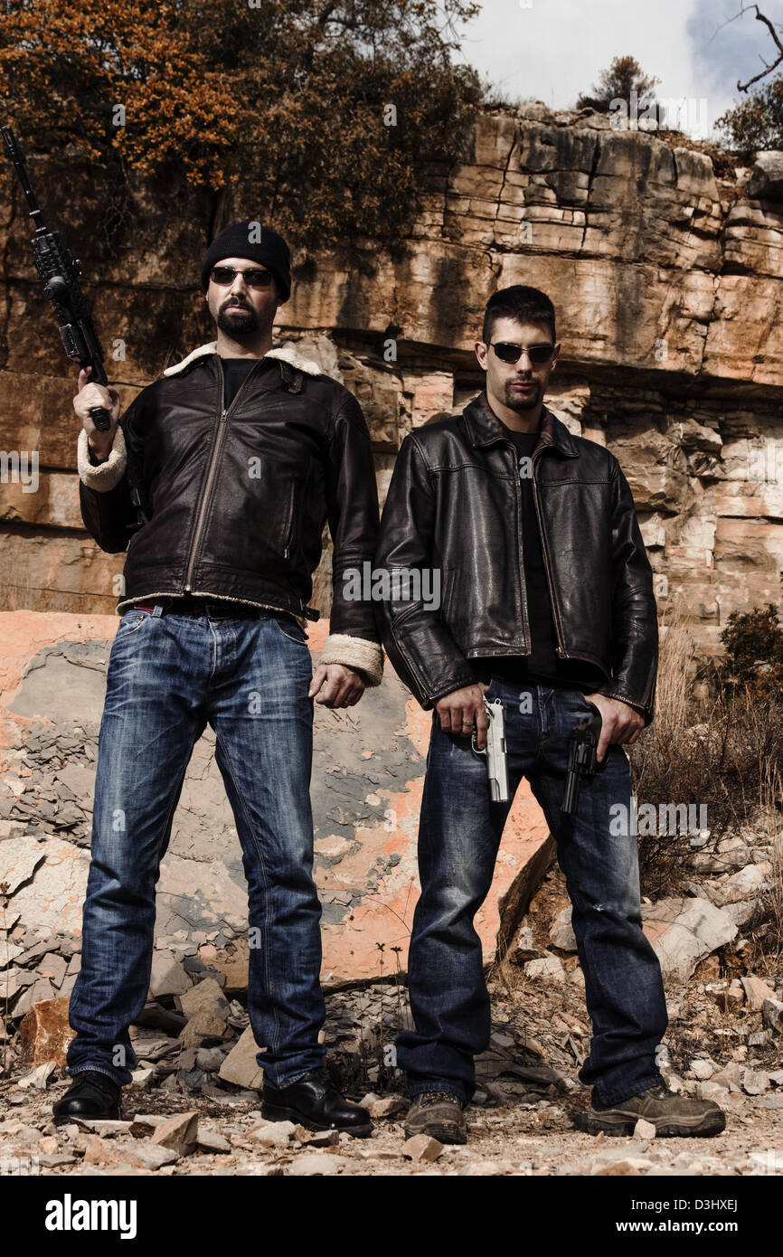 View of a group of gang members with guns Stock Photo - Alamy