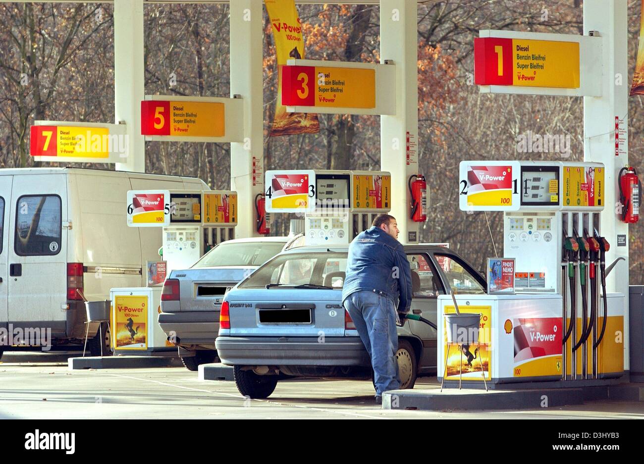General view of petrol pumps at shell petrol station hi-res stock ...