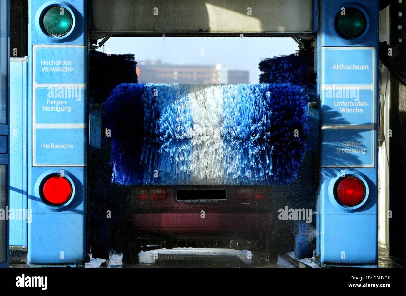 (dpa) - A car moves slowly through the automated car-wash installation ...