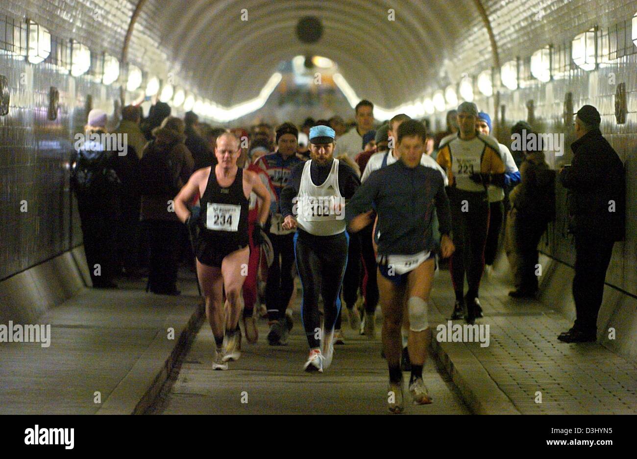 Group run through tunnel hi-res stock photography and images - Alamy