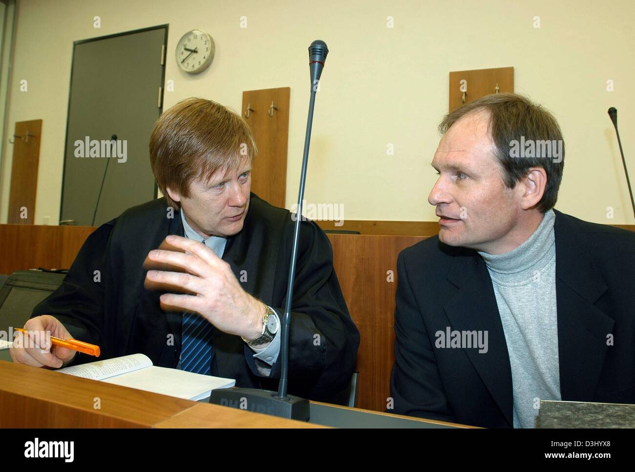 (dpa) - 42-year-old German computer specialist Armin Meiwes (R) listens ...