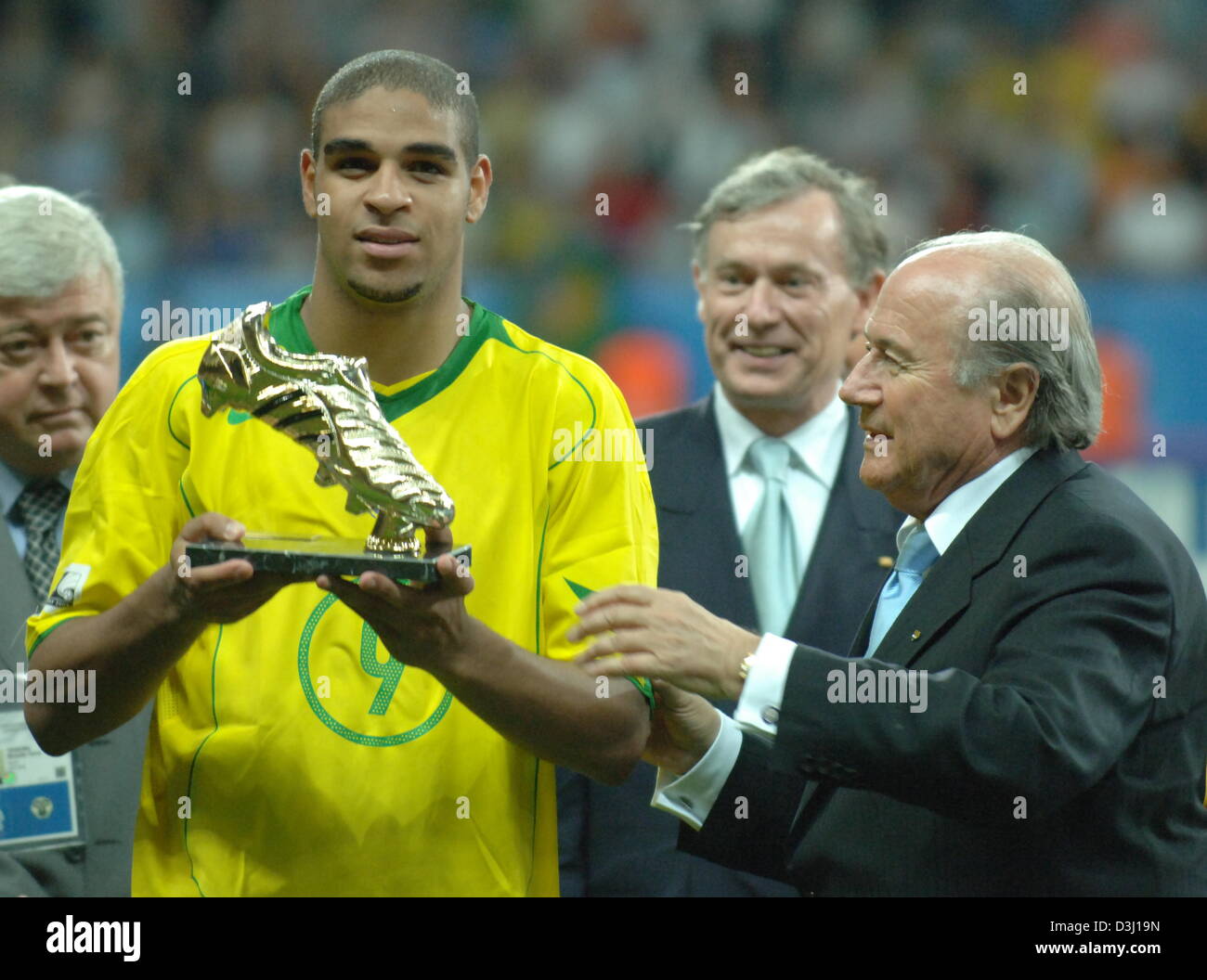 (dpa) - Brazilian soccer player Adriano holds the trophy for the best ...