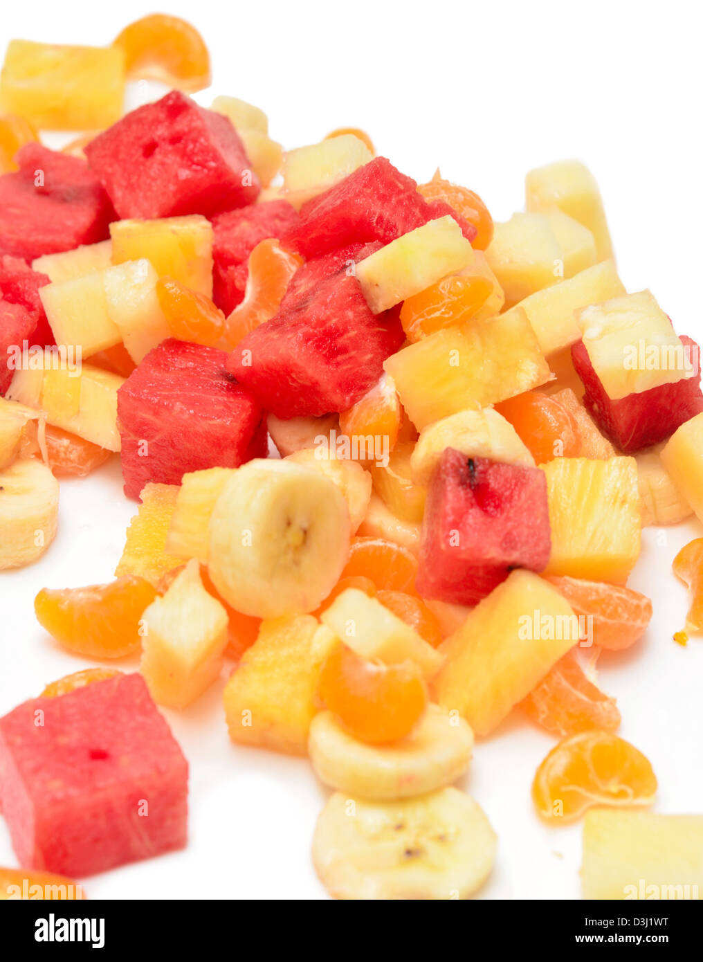 pieces of fruits on white Stock Photo - Alamy