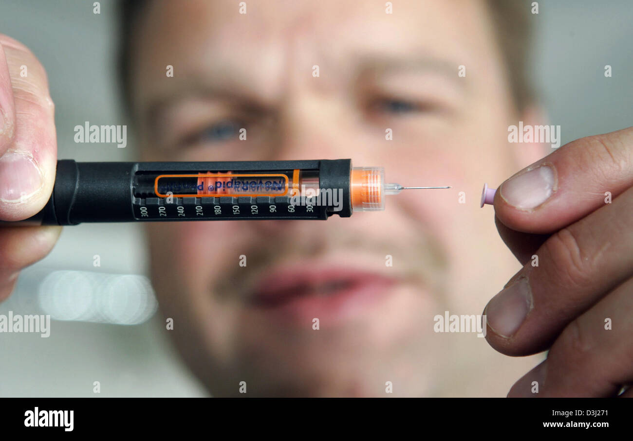 (dpa) - A diabetic prepares his syringe with insulin, a so-called ...