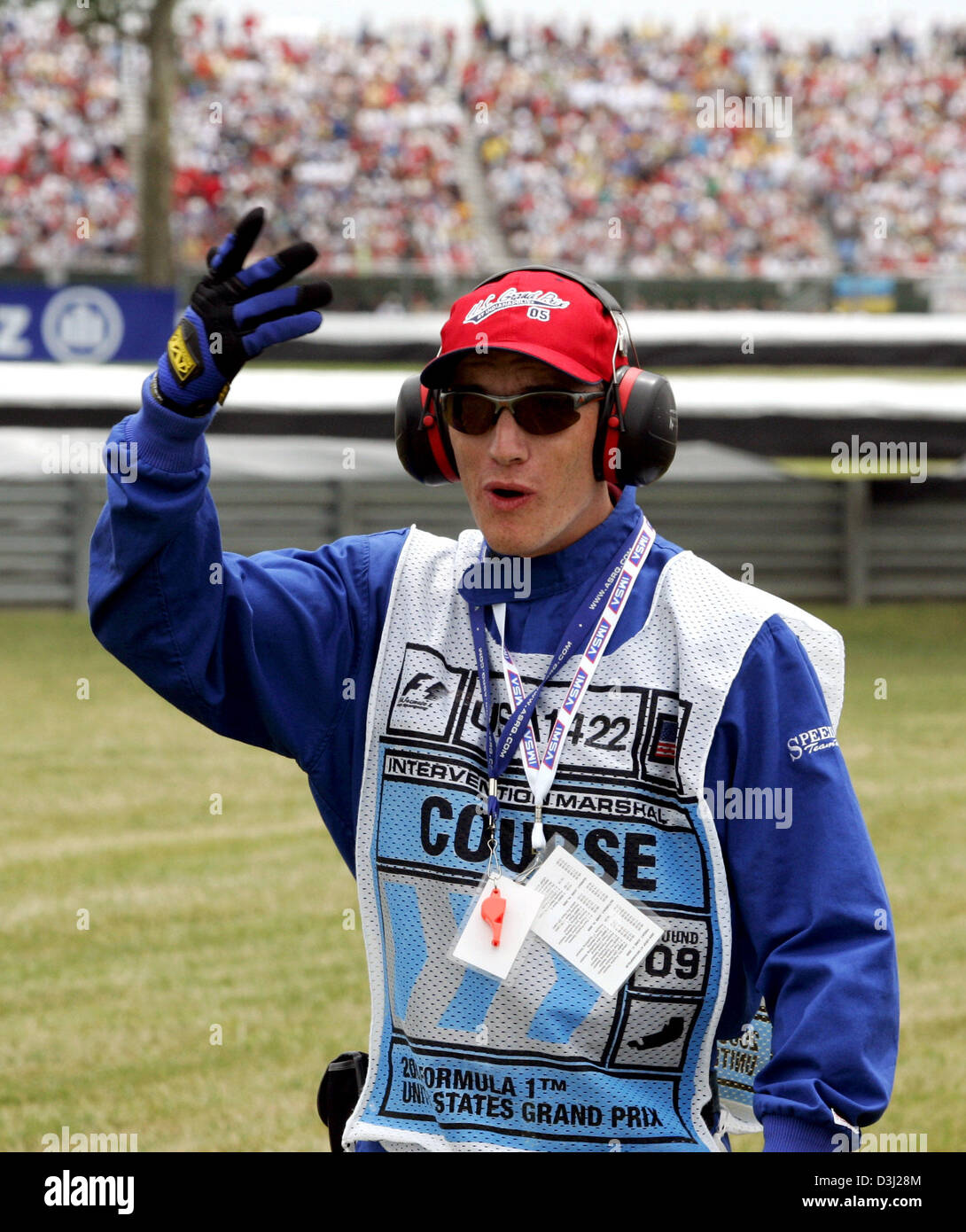(dpa) - The picture shows a Formula One racetrack marshall shortly ...