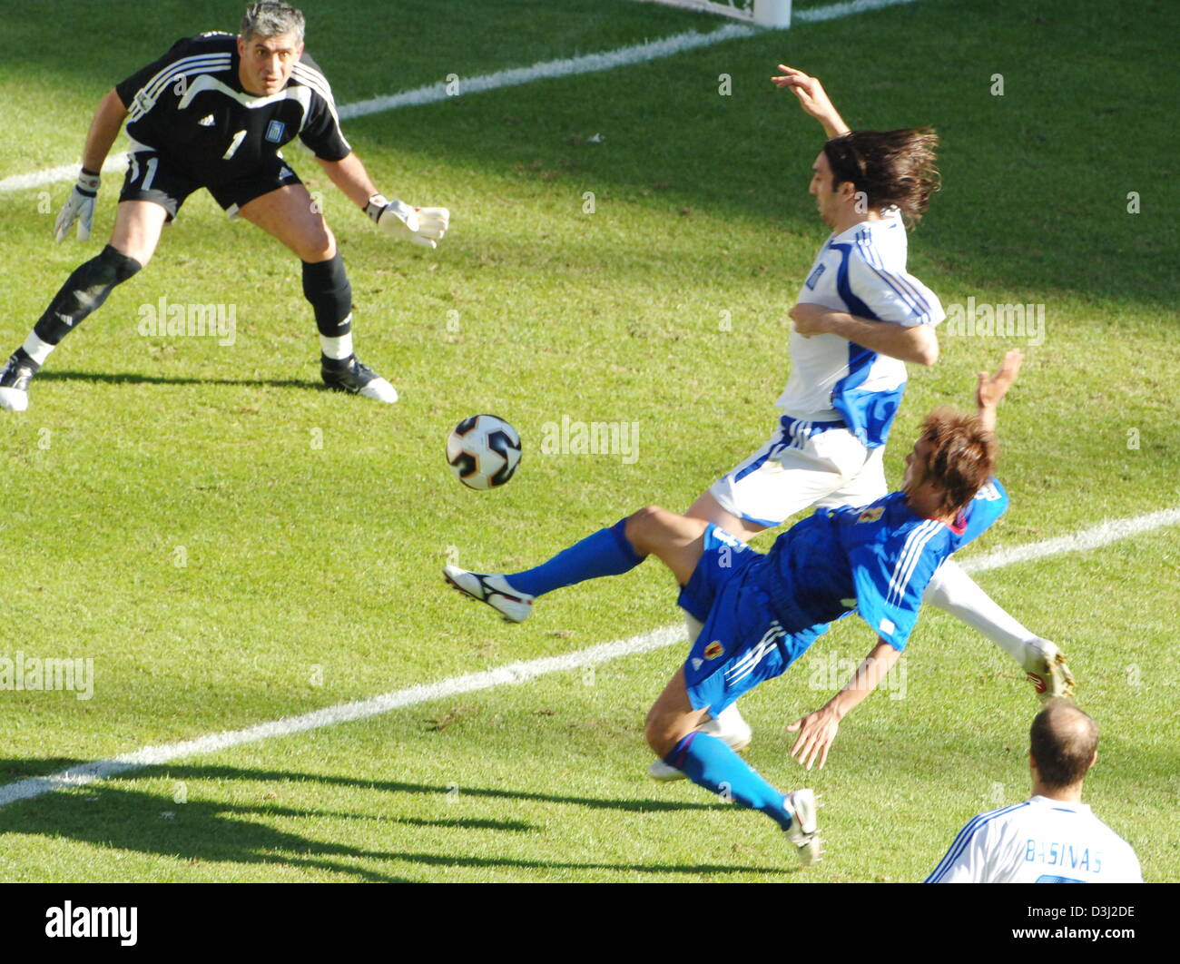 Greek soccer player Sotirios Kyrgiakos (2nd from R, back) fights for ...