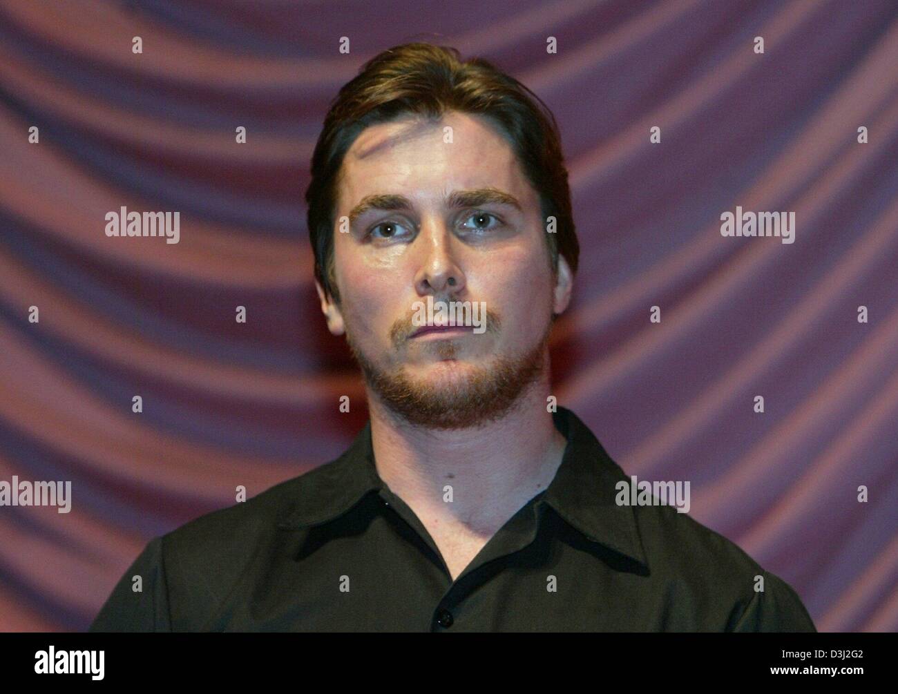 (dpa) - British actor Christian Bale smiles as he awaits the premiere ...