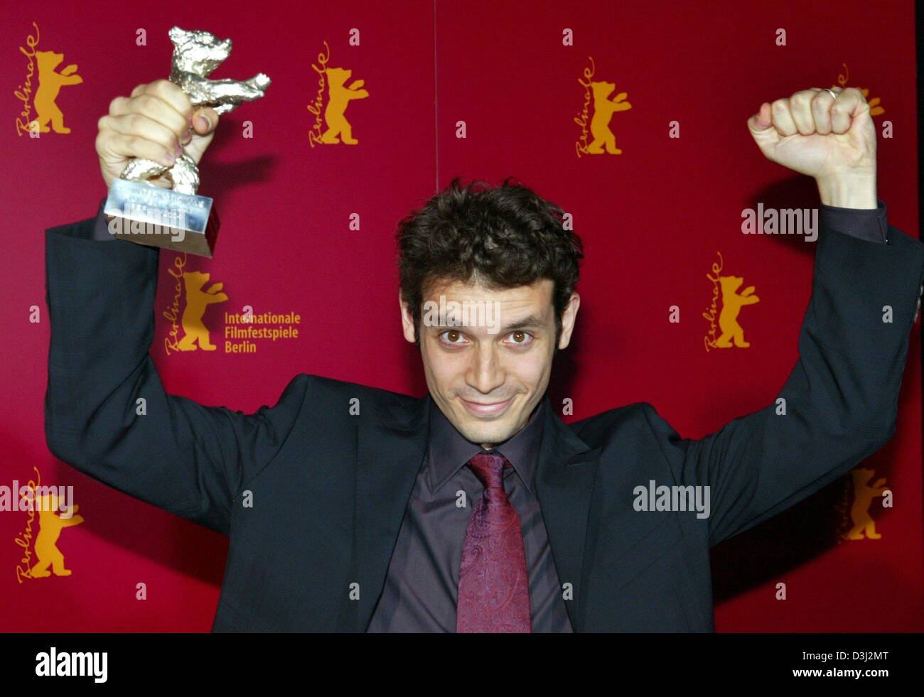 (dpa) - Argentine director Daniel Burman cheers and gestures as he ...
