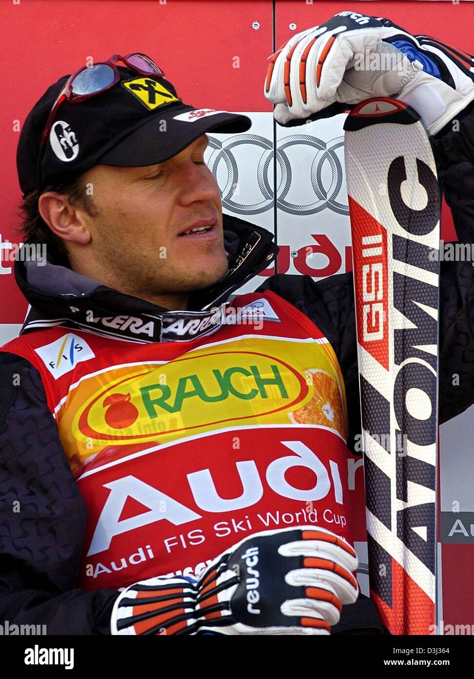(dpa) - Austtria's Hermann Maier smiles as he rests his arms on his ...