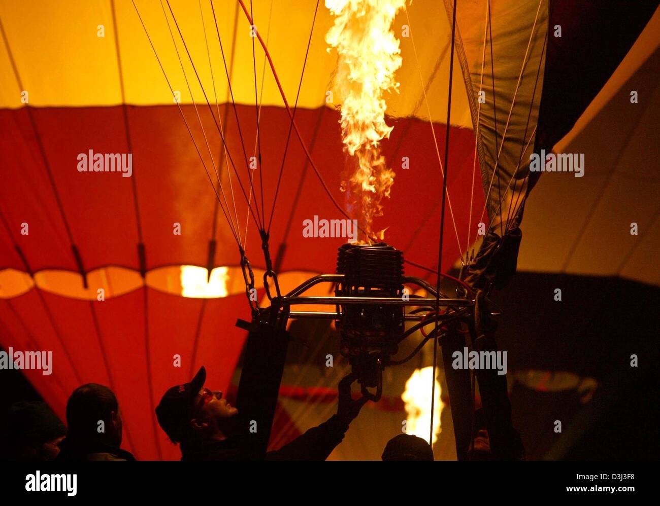 Balloons firing up hi-res stock photography and images - Alamy