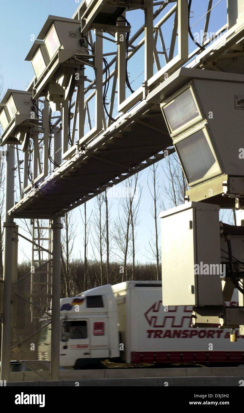 (dpa files) - A lorry passes under a gantry which should have logged ...