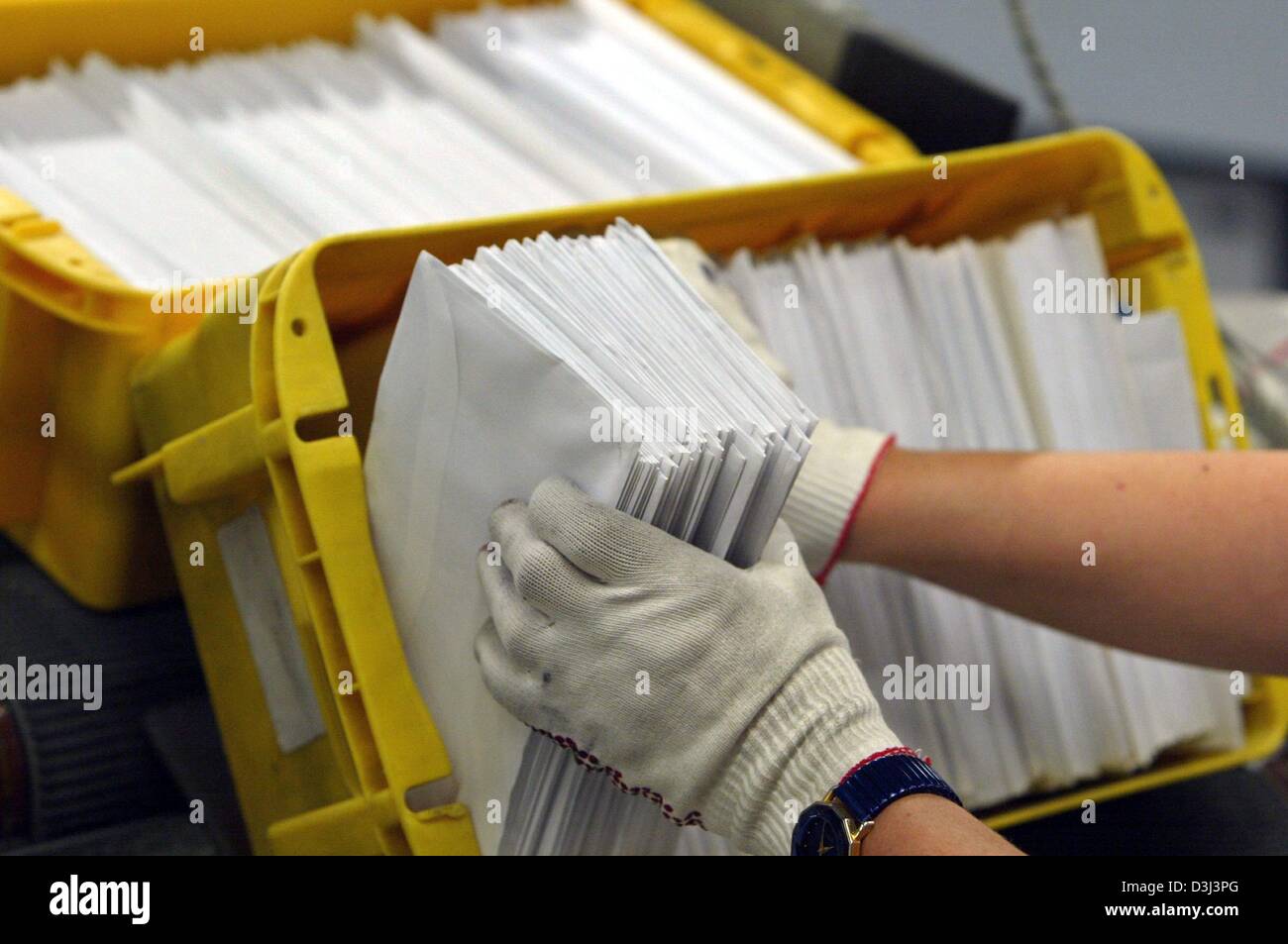 (dpa) - An employee sorts letters according to their destinations at ...
