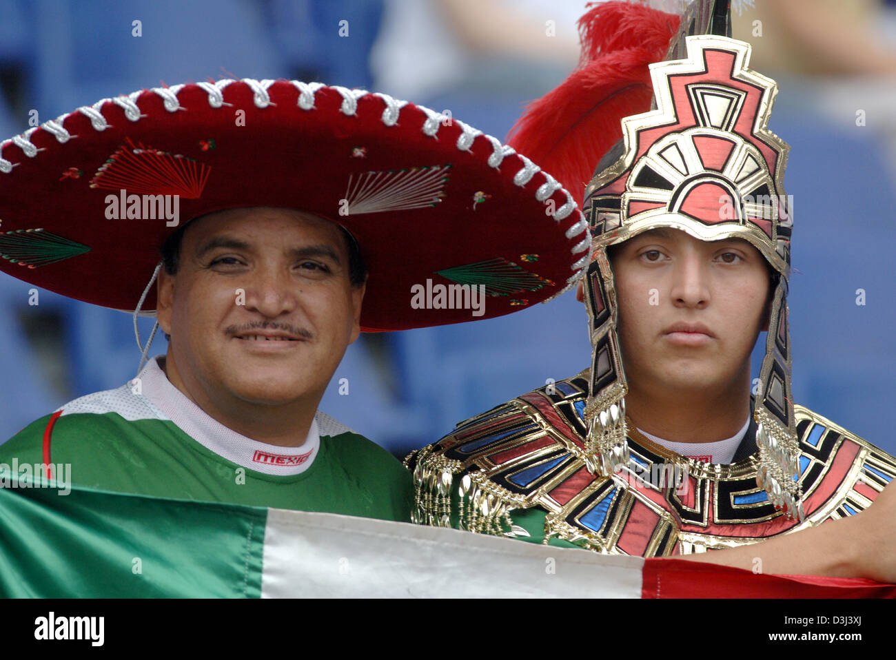 (dpa) - The picture shows Mexican fans dressed up in traditional ...