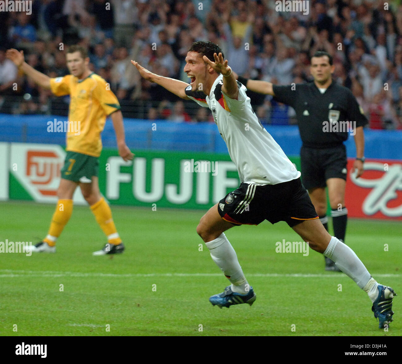 (dpa) - German soccer player Kevin Kuranyi celebrates his goal while ...