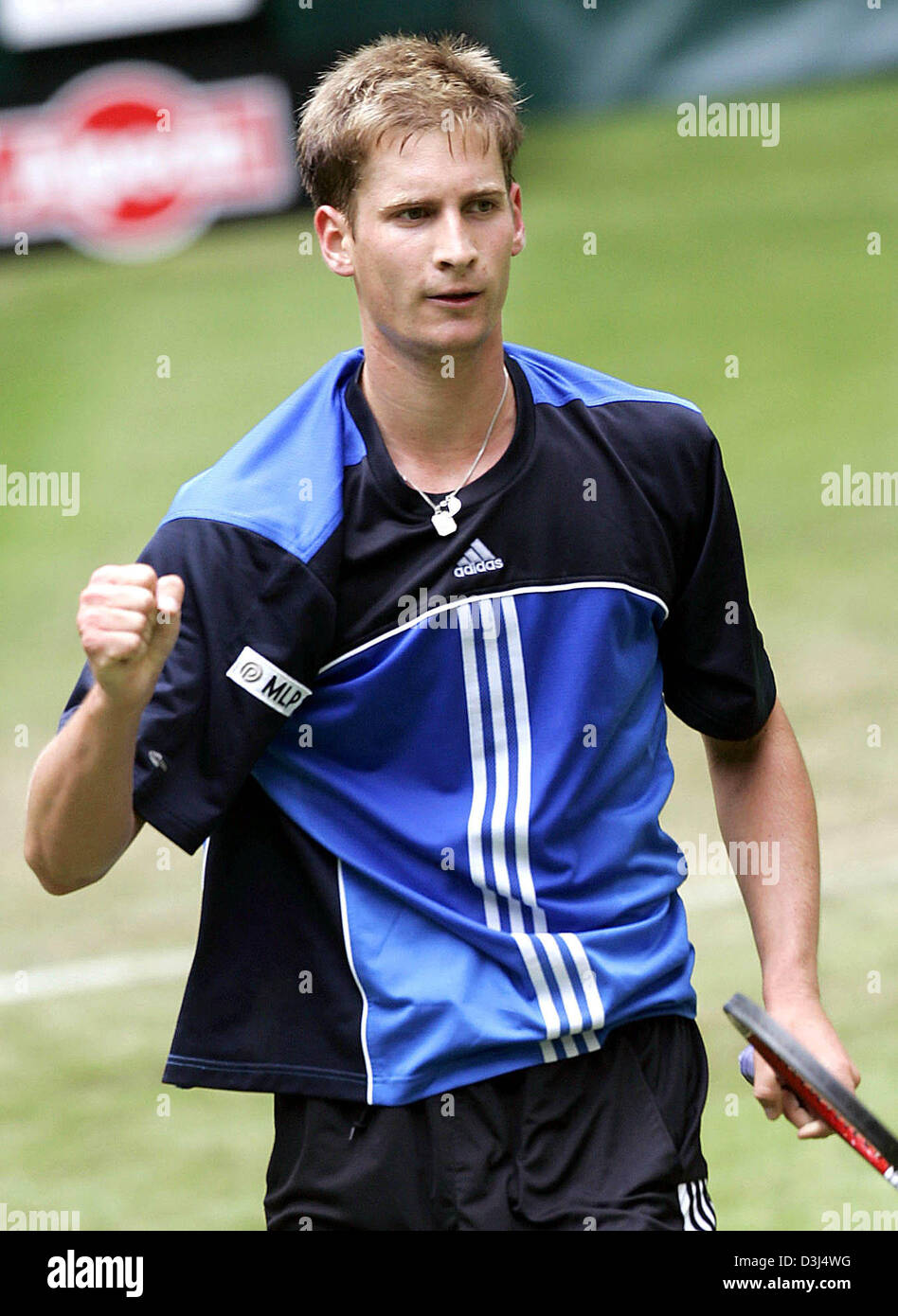 (dpa) - German tennis pro Florian Mayer strikes a pose after his match ...