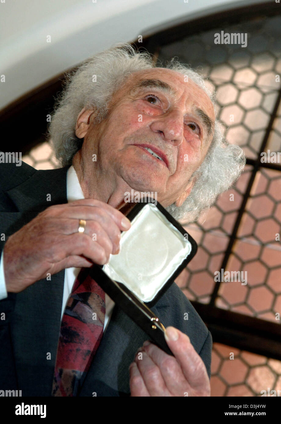 Human interest hum people presenting medal smiling awarding award ...