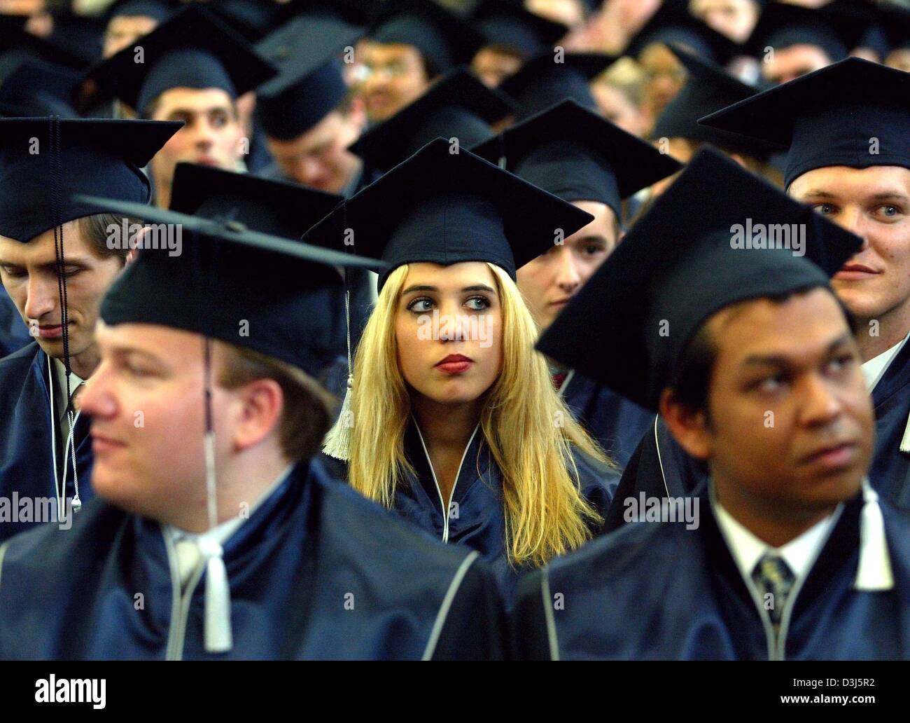 University graduates attend graduation ceremony hi-res stock ...