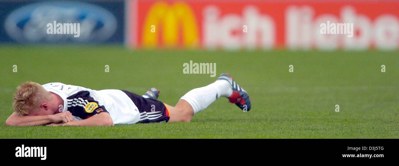 Sports spo soccer pitch player sad lying advertisements germany hi-res ...