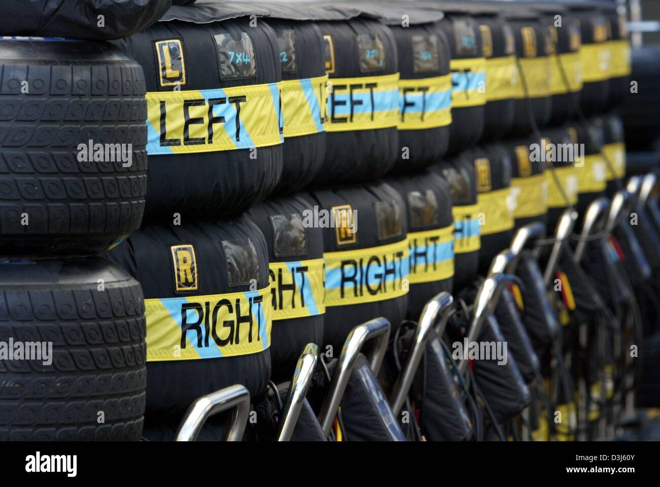 (dpa) - Stacks of tires can be seen in the pit area during the training ...