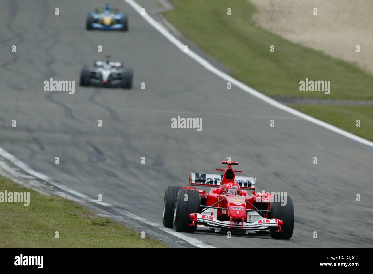 (dpa) - German Formula 1 champion Michael Schumacher (team Ferrari) is ...