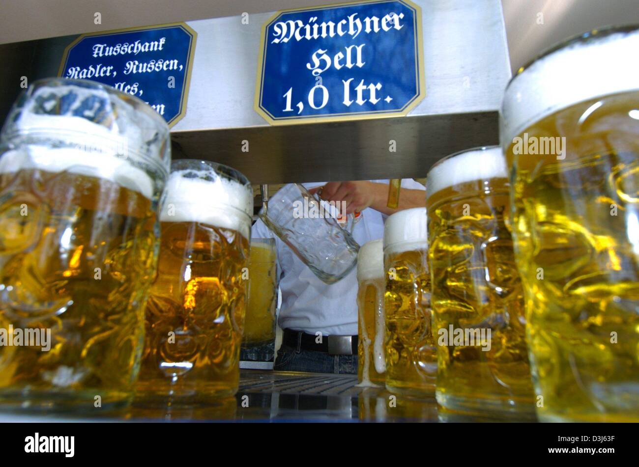 (dpa) - Delicious draft beer stands on display on the counter of a pub ...