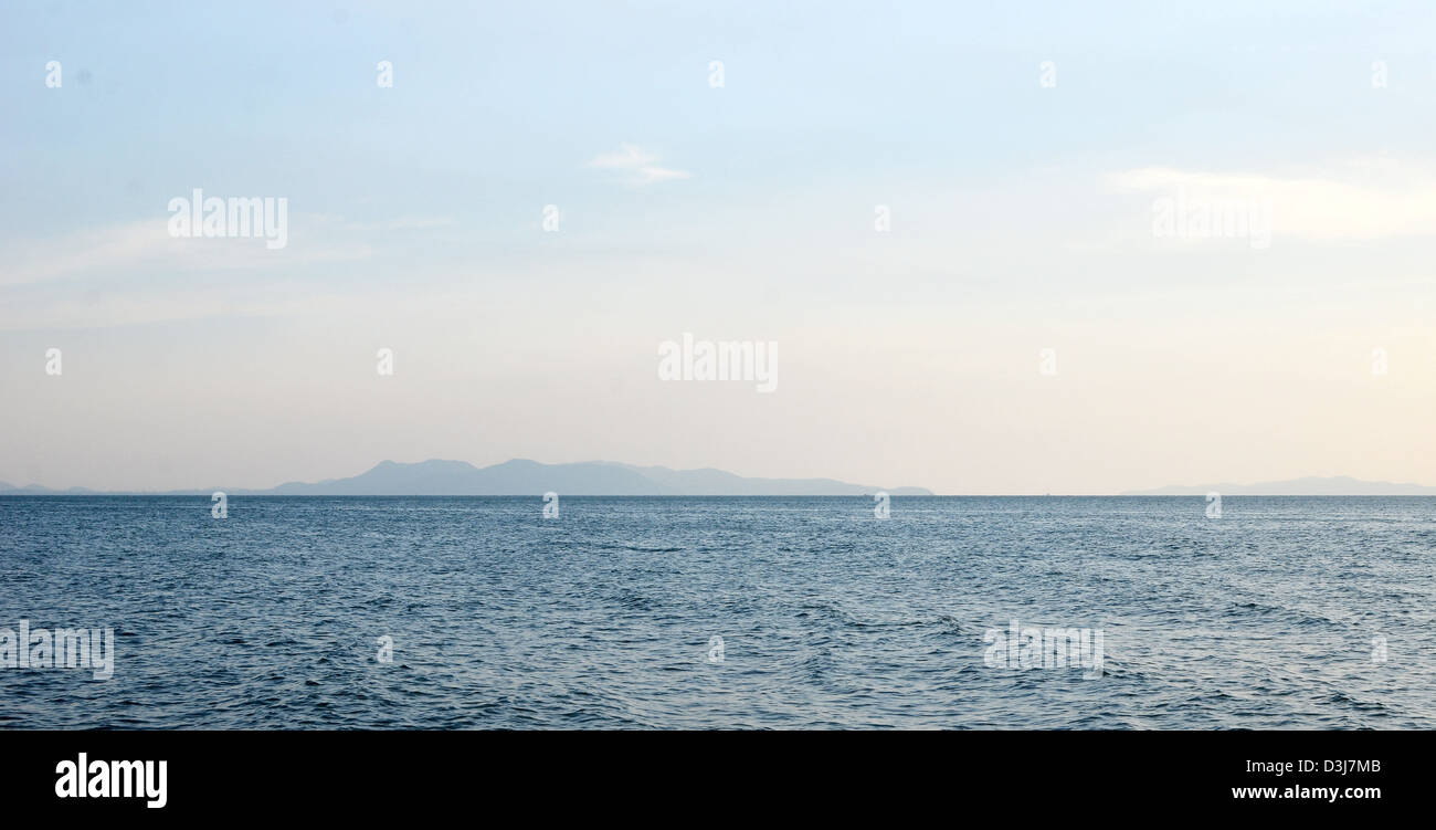 beauty sunset over blue sea Stock Photo - Alamy