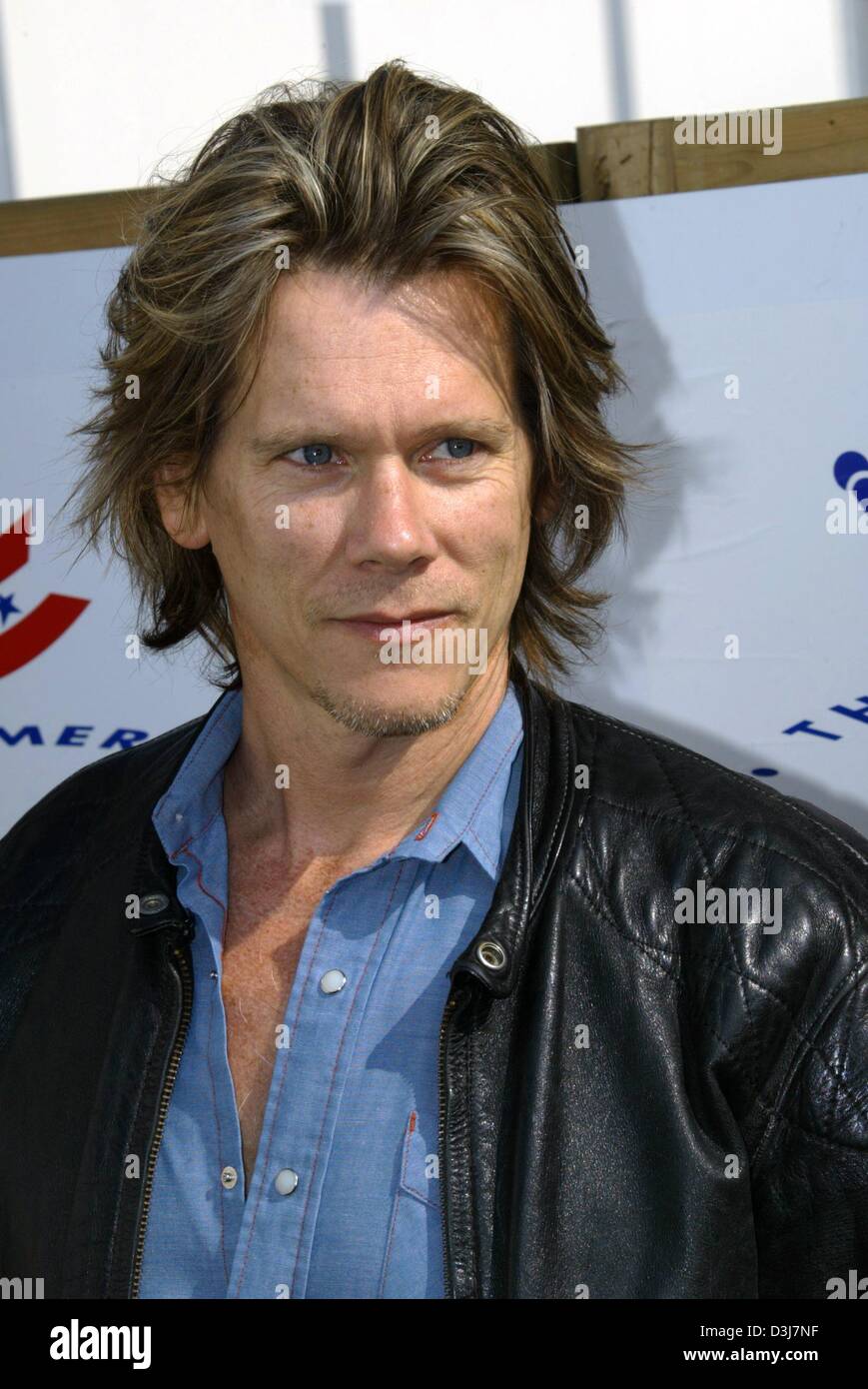 (dpa) - US actor Kevin Bacon smiles as he poses during the 57th Cannes ...