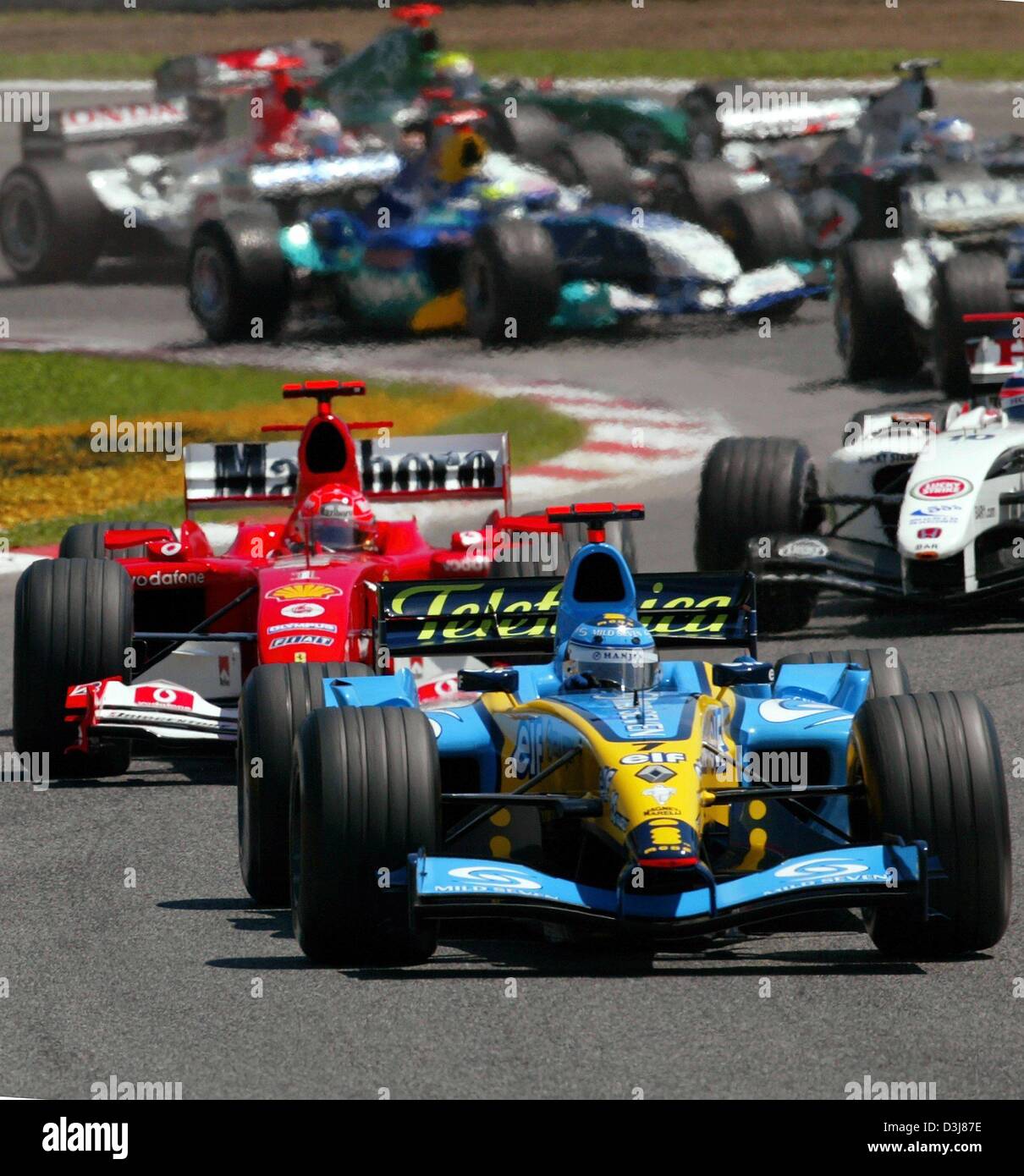 (dpa) - Italian formula one pilot Jarno Trulli of Renault (front) leads ...