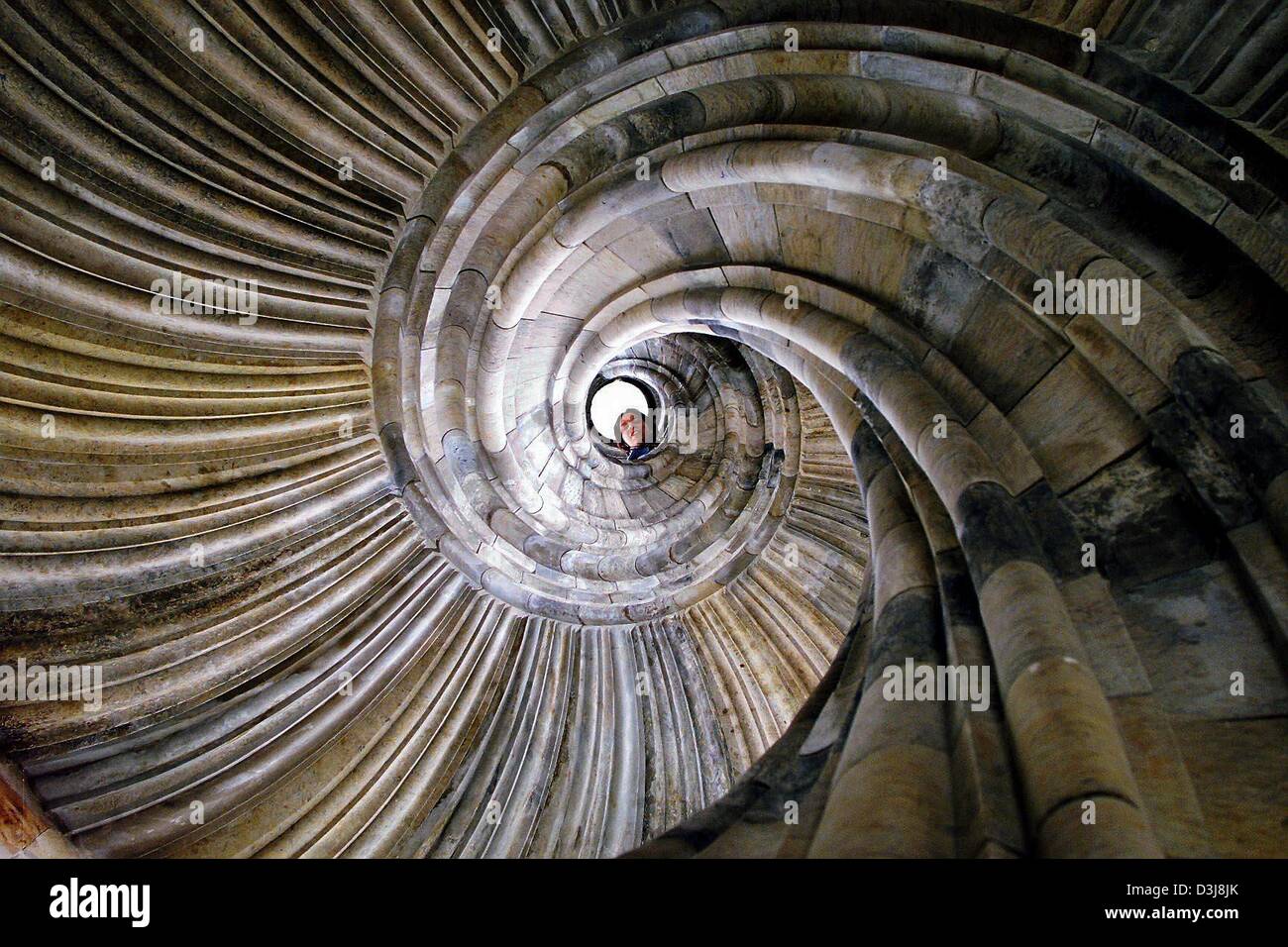 (dpa) - A visitor looks down the centre of a spiral staircase at ...