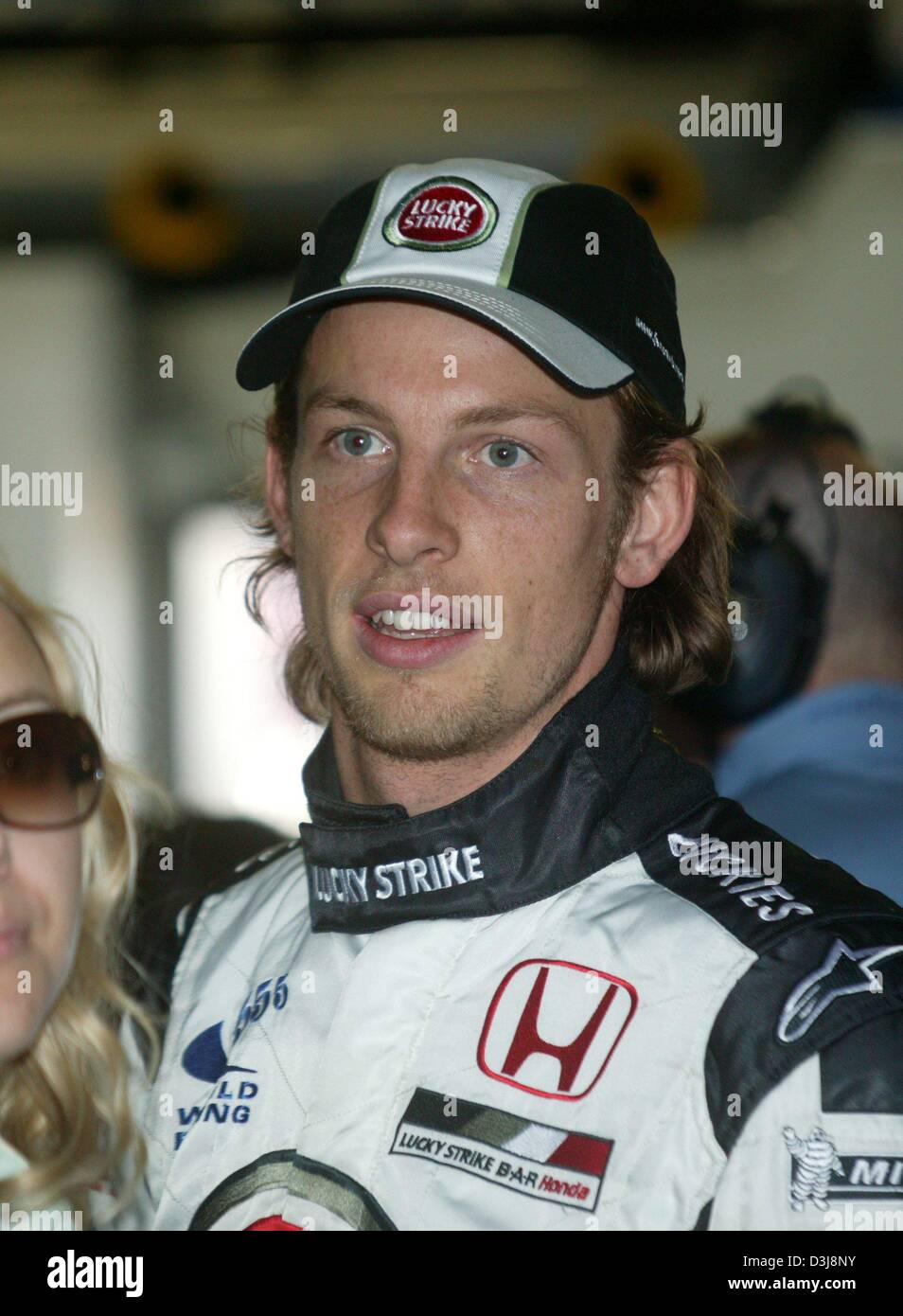 (dpa) - English Formula One pilot Jenson Button (Team BAR-Honda) looks ...