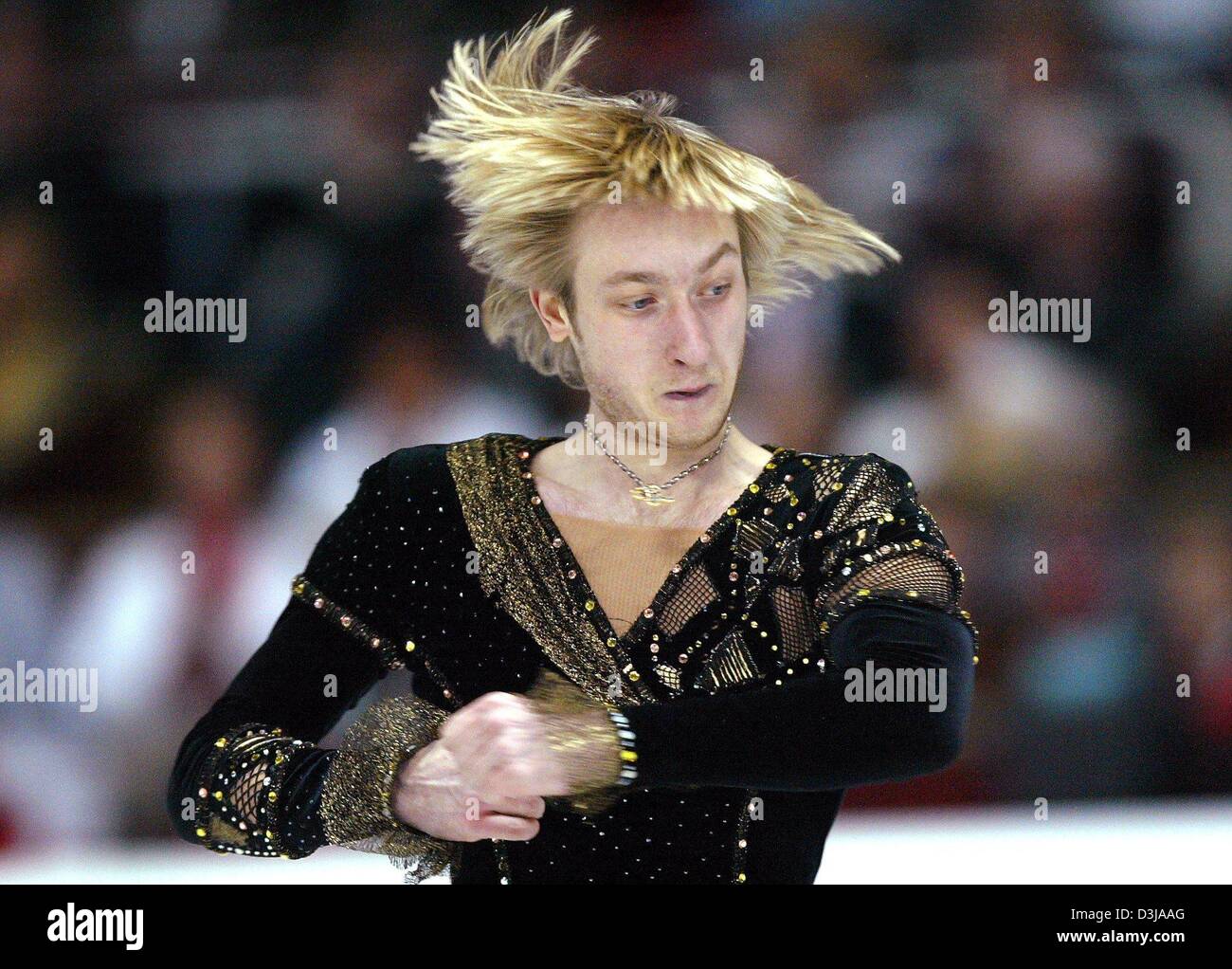 (dpa) Yevgeny Plushenko from Russia performs at the Figure Skating ...