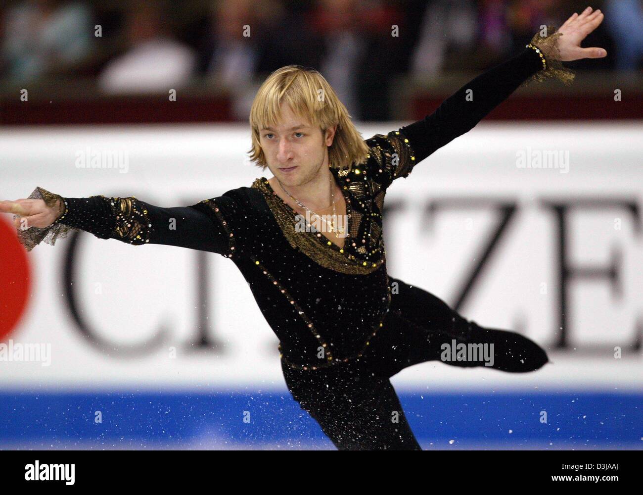 (dpa) Yevgeny Plushenko from Russia performs at the Figure Skating ...