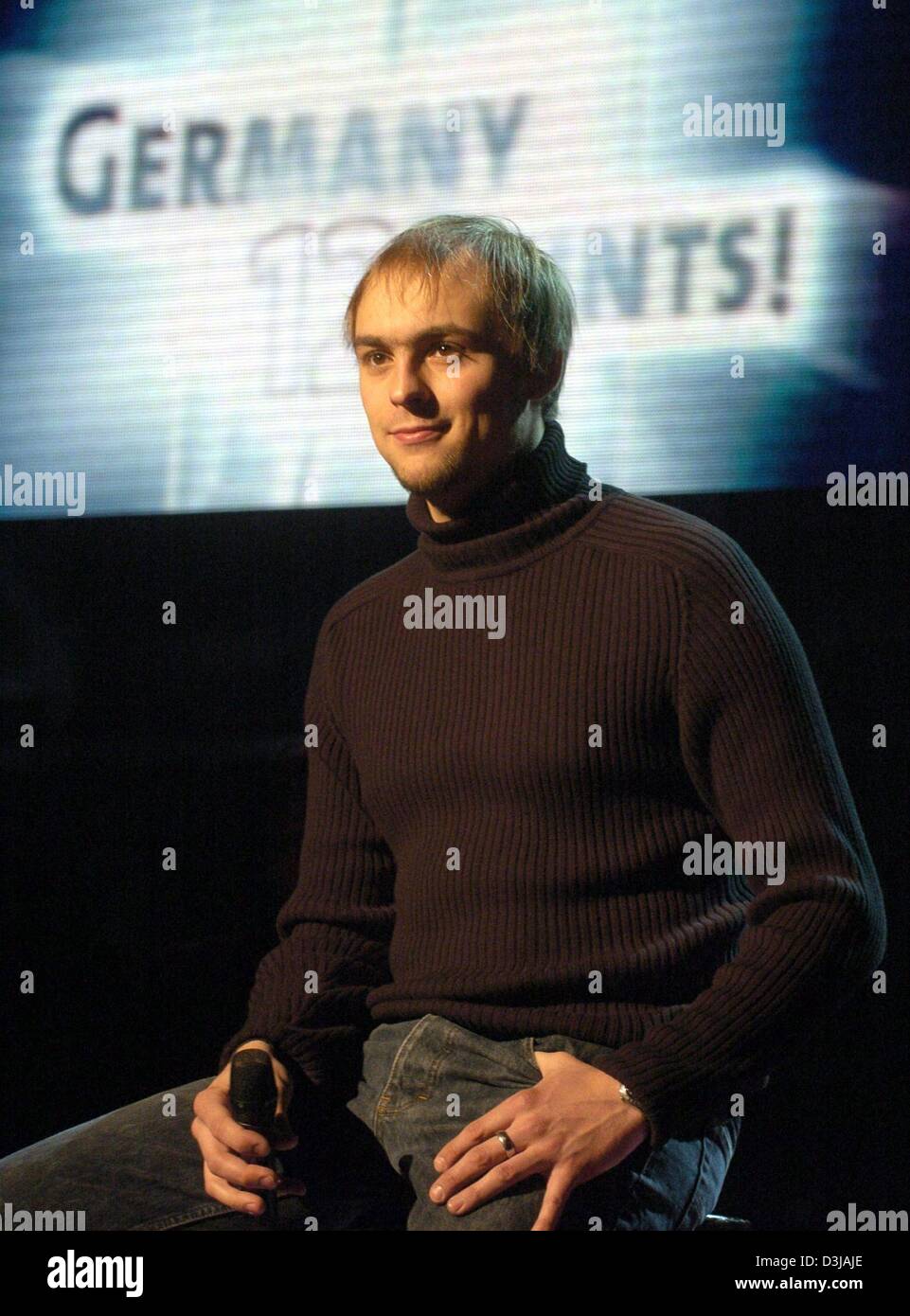 (dpa) - 22-year-old German singer Max sits on a stool and holds a ...