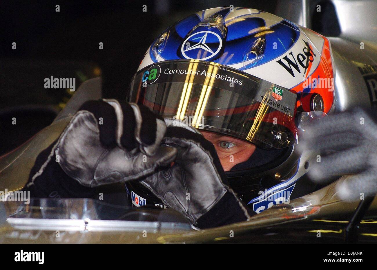 (dpa) The Finnish F1 pilot Kimi Raikkonen concentrates during the free ...