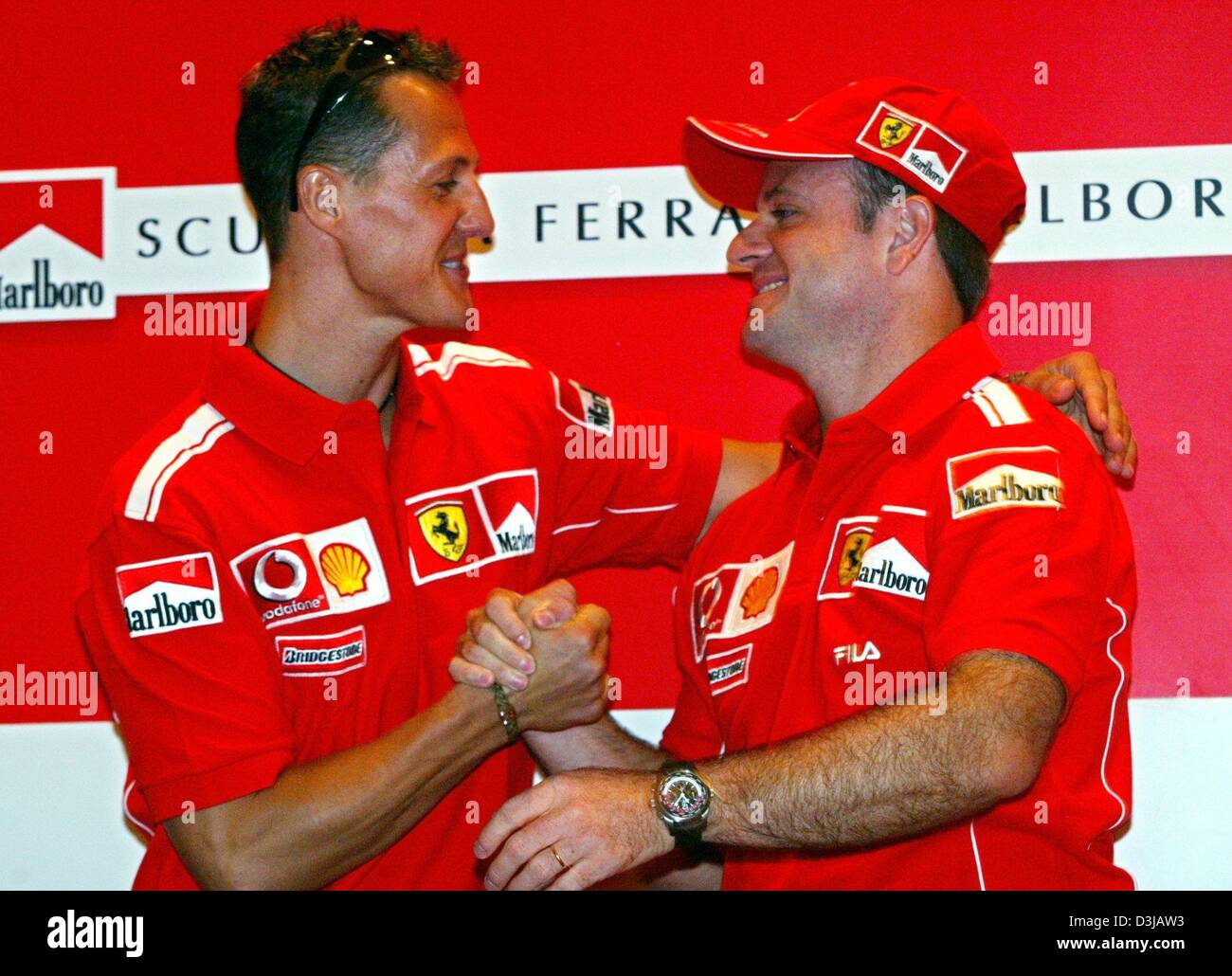 (dpa) The German F1 world champion Michael Schumacher (left) and his ...