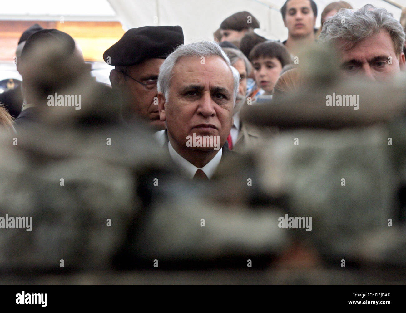After depositing a wreath Israeli President Moshe Katsav prays at the ...