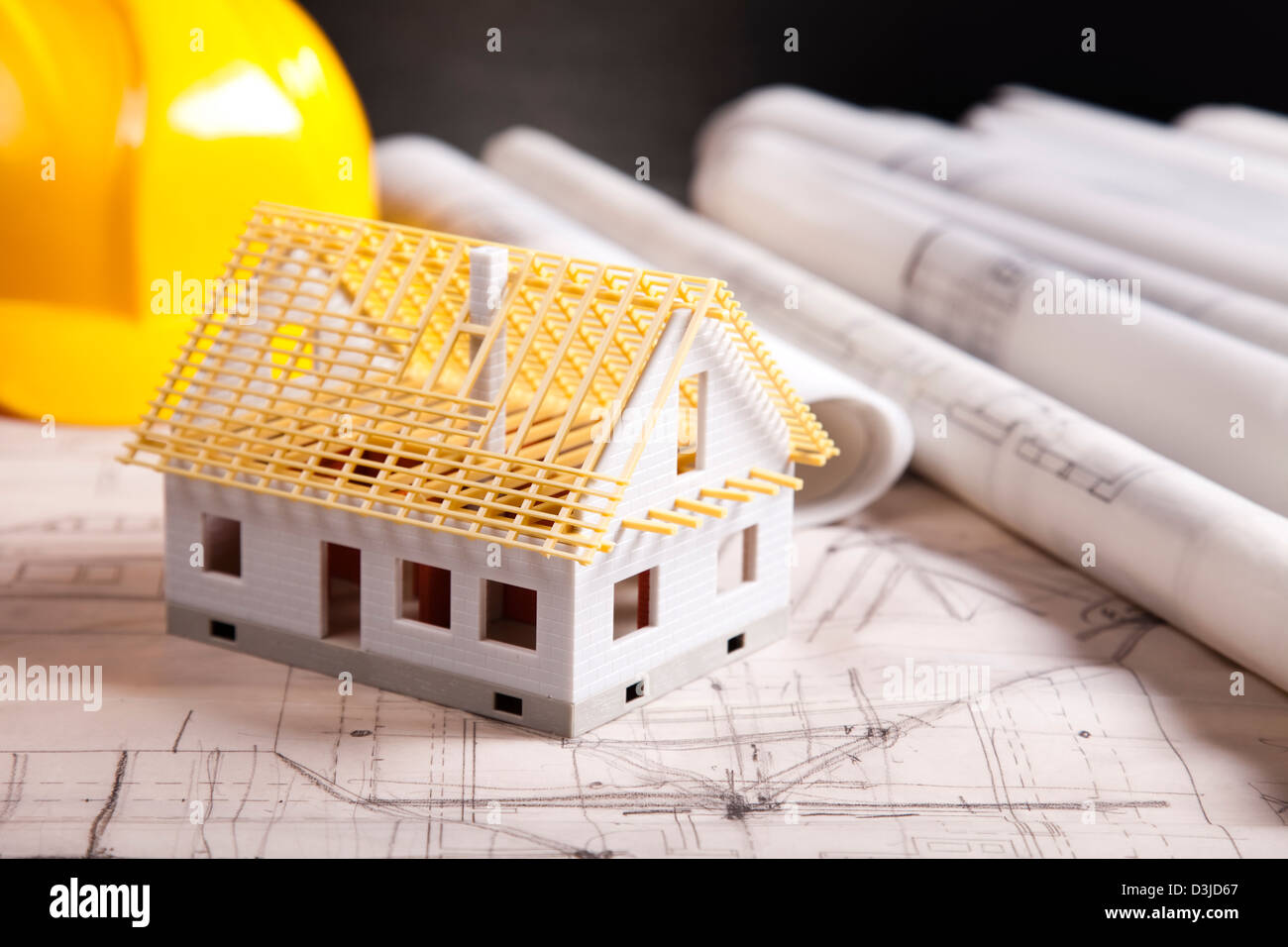 Architectural plans of house and hard hat Stock Photo - Alamy