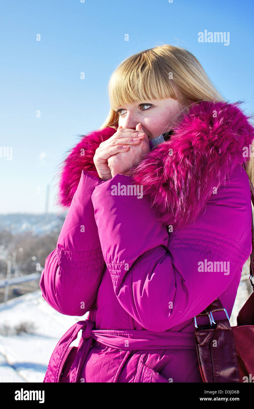 Woman warming face sun hi-res stock photography and images - Alamy