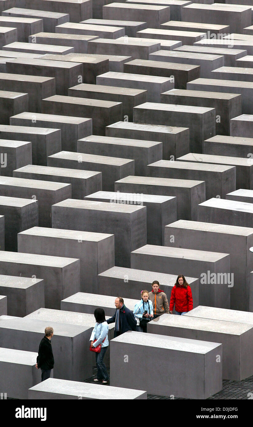 (dpa) - Visitors walk between the columns of concrete blocks at the ...