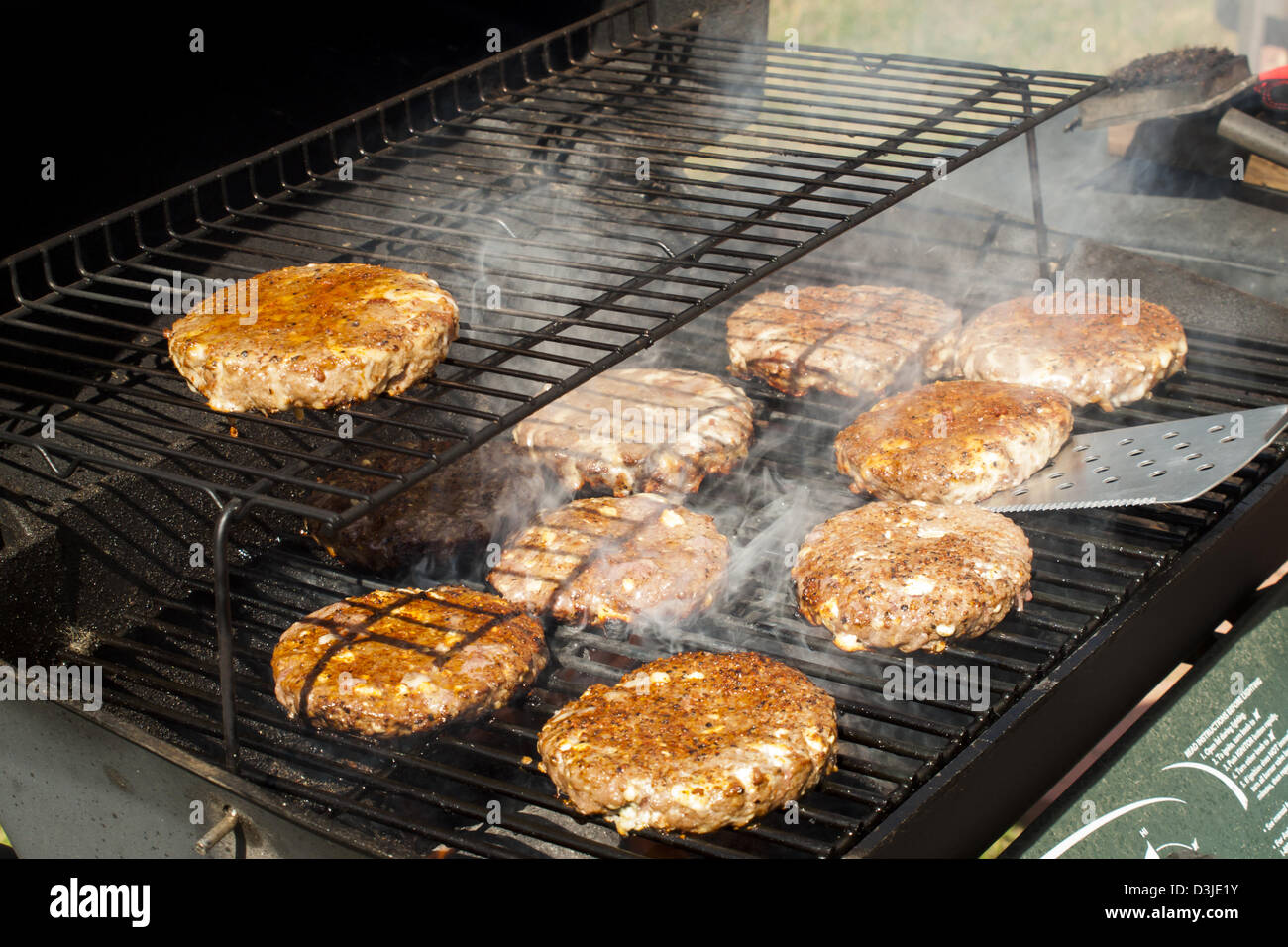 Gourmet hamburger parries on the grill Stock Photo - Alamy