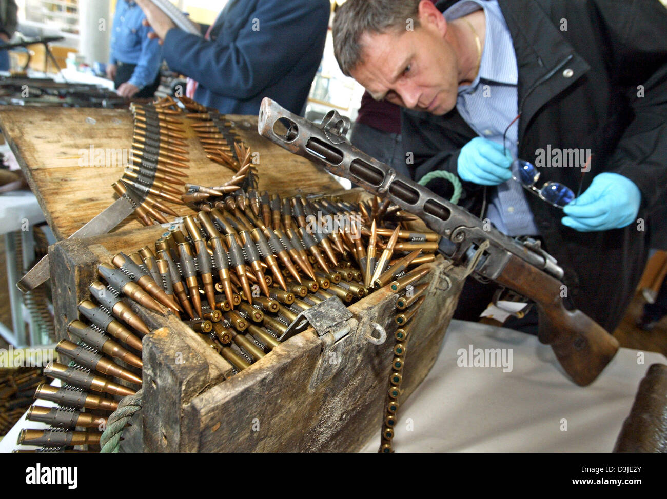 Crime law justice clj police machine gun weapon bullets male raid ...