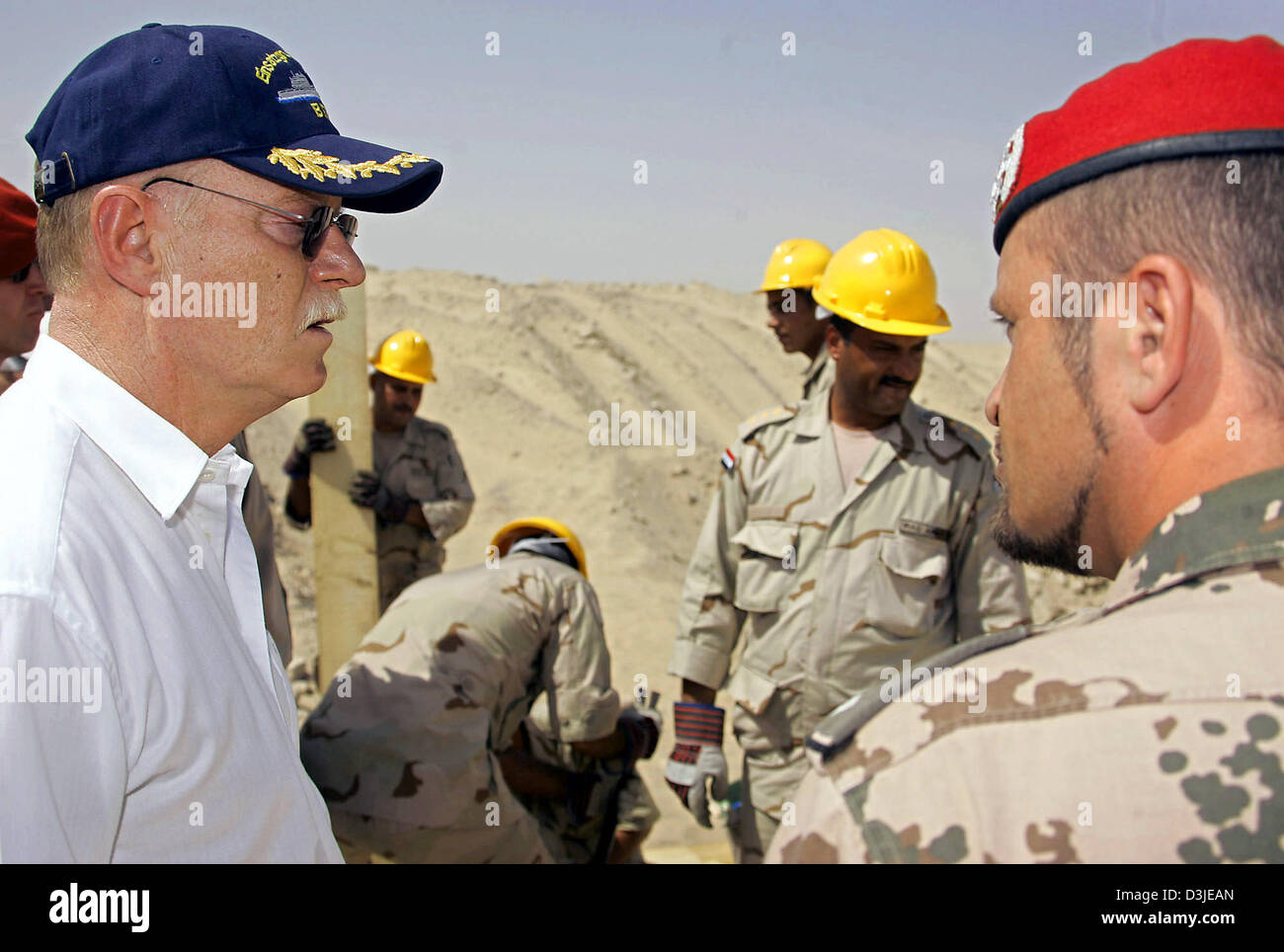 (dpa) - German Defense Minister Peter Struck (L) visits the German ...