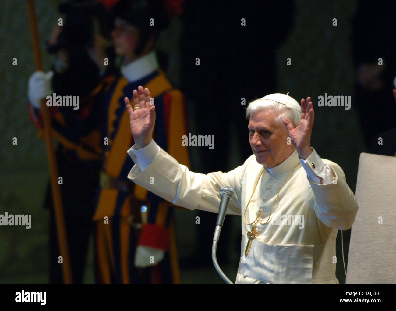 (dpa) - Pope Benedict XVI raises his arms as he welcomes pilgrims ...