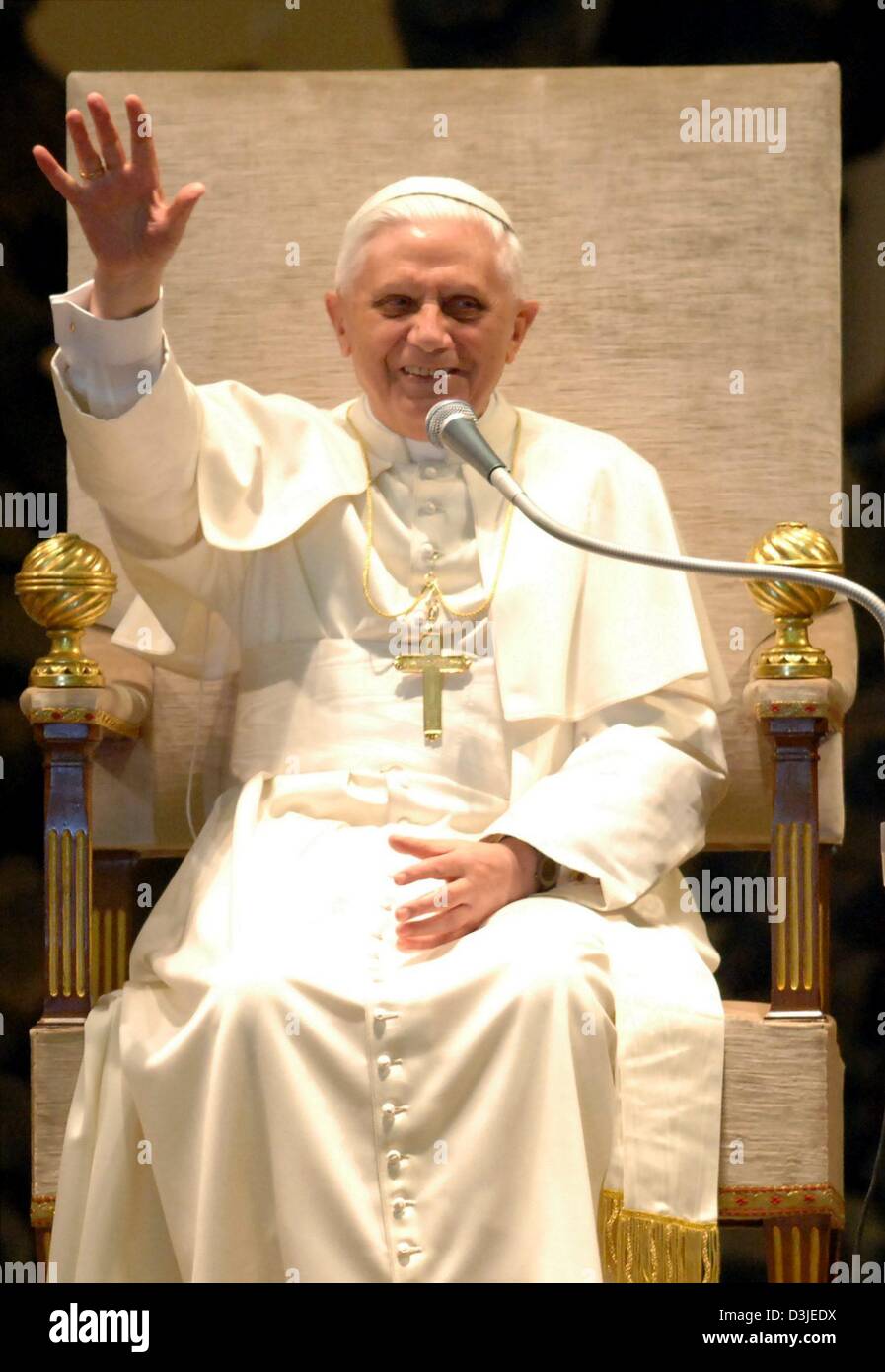 (dpa) - Pope Benedict XVI gestures and smiles as he greets several ...