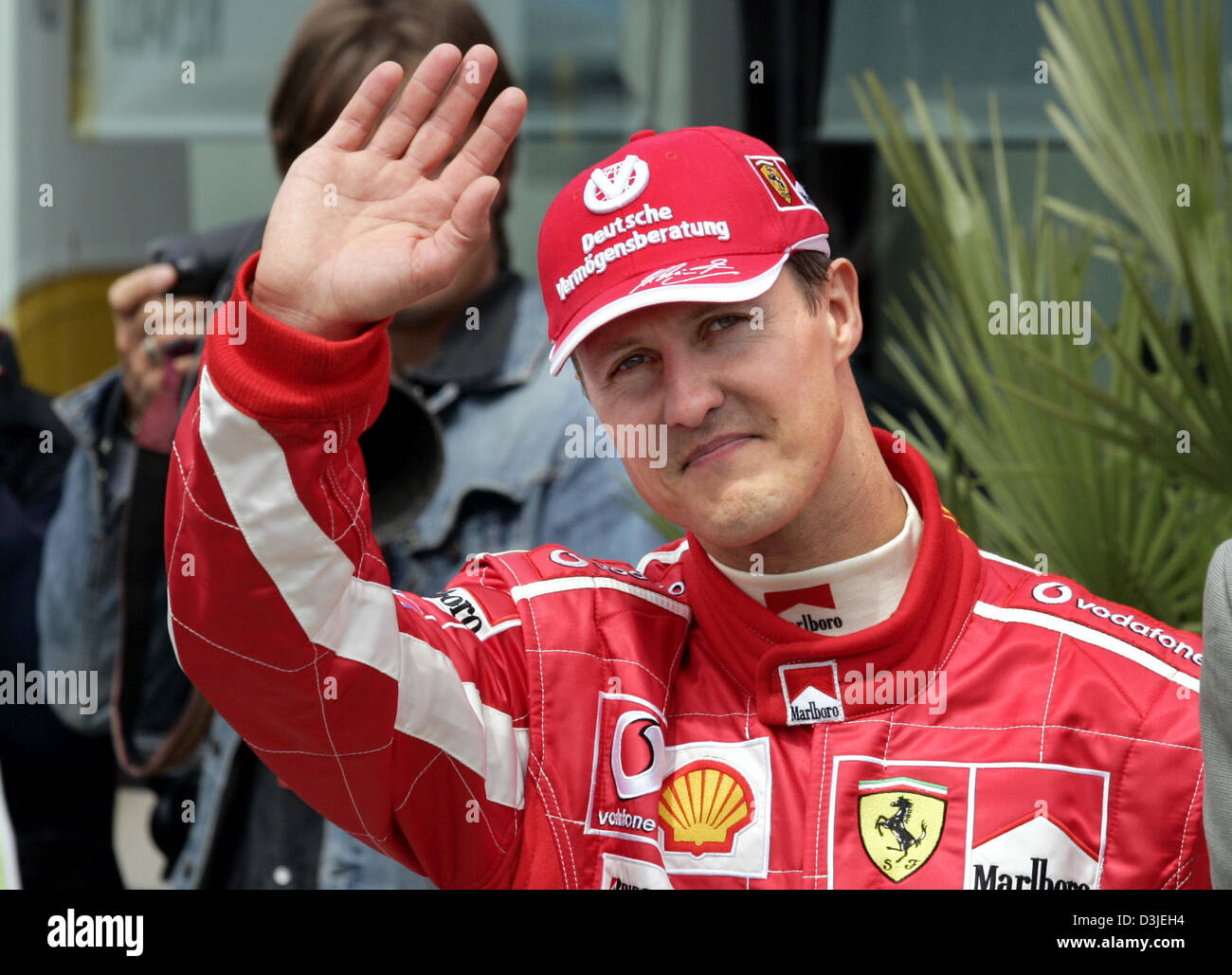 (dpa) - German Formula One driver Michael Schumacher of Ferrari waves ...