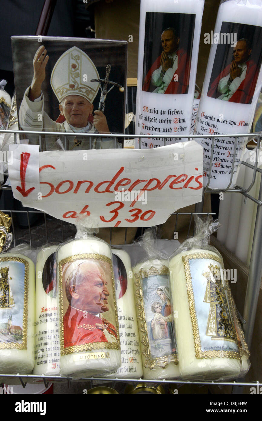 (dpa) - Candles featureing the picture of the late Pope John Paul II ...