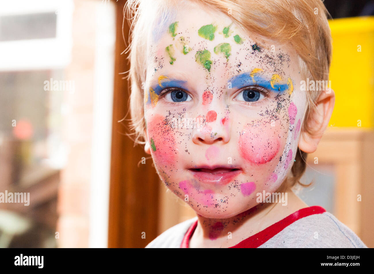 Young girl with decorated painted face Stock Photo - Alamy