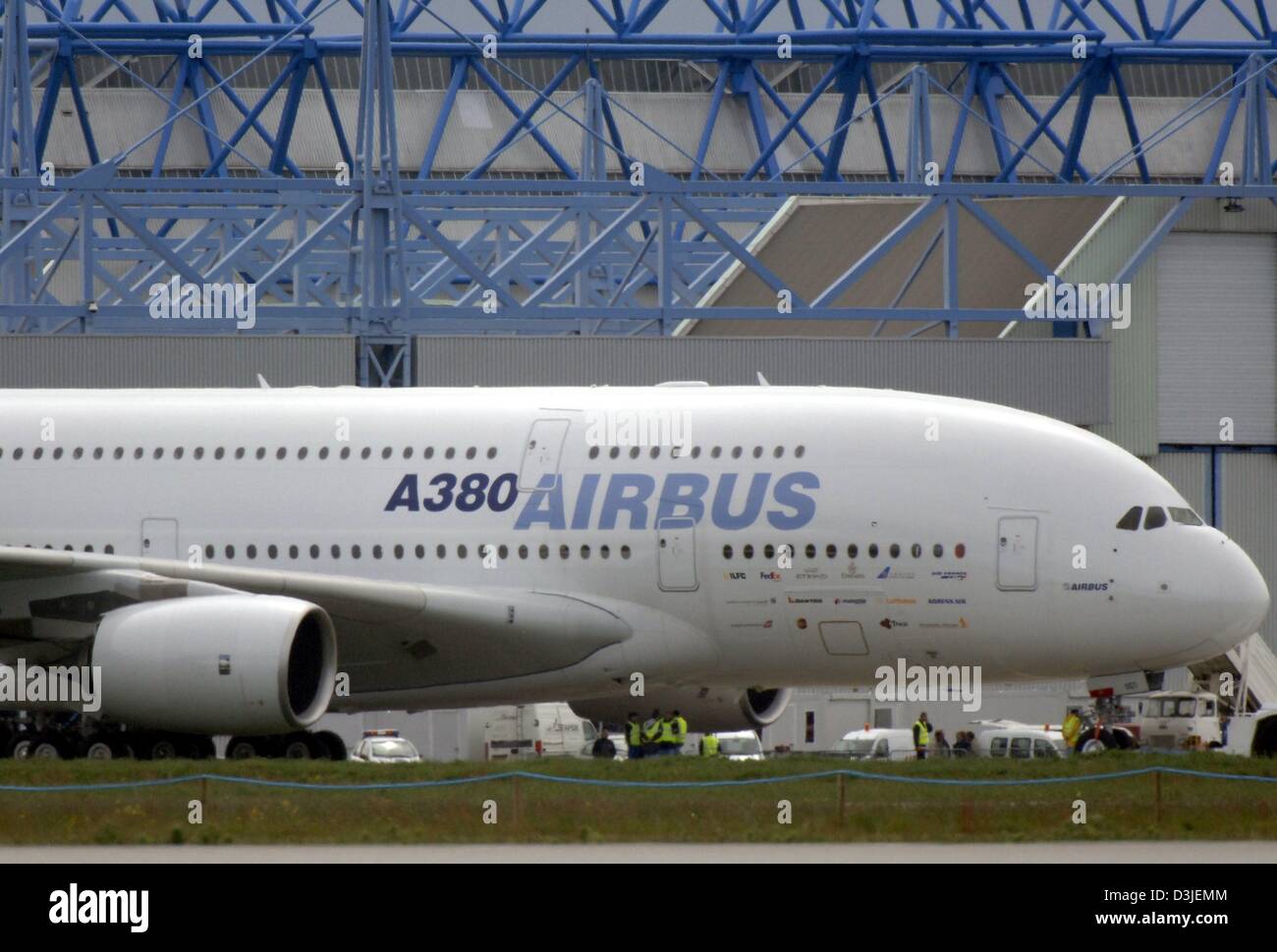 (dpa) - Technicians inspect the prototype of the new Airbus A380 at the ...